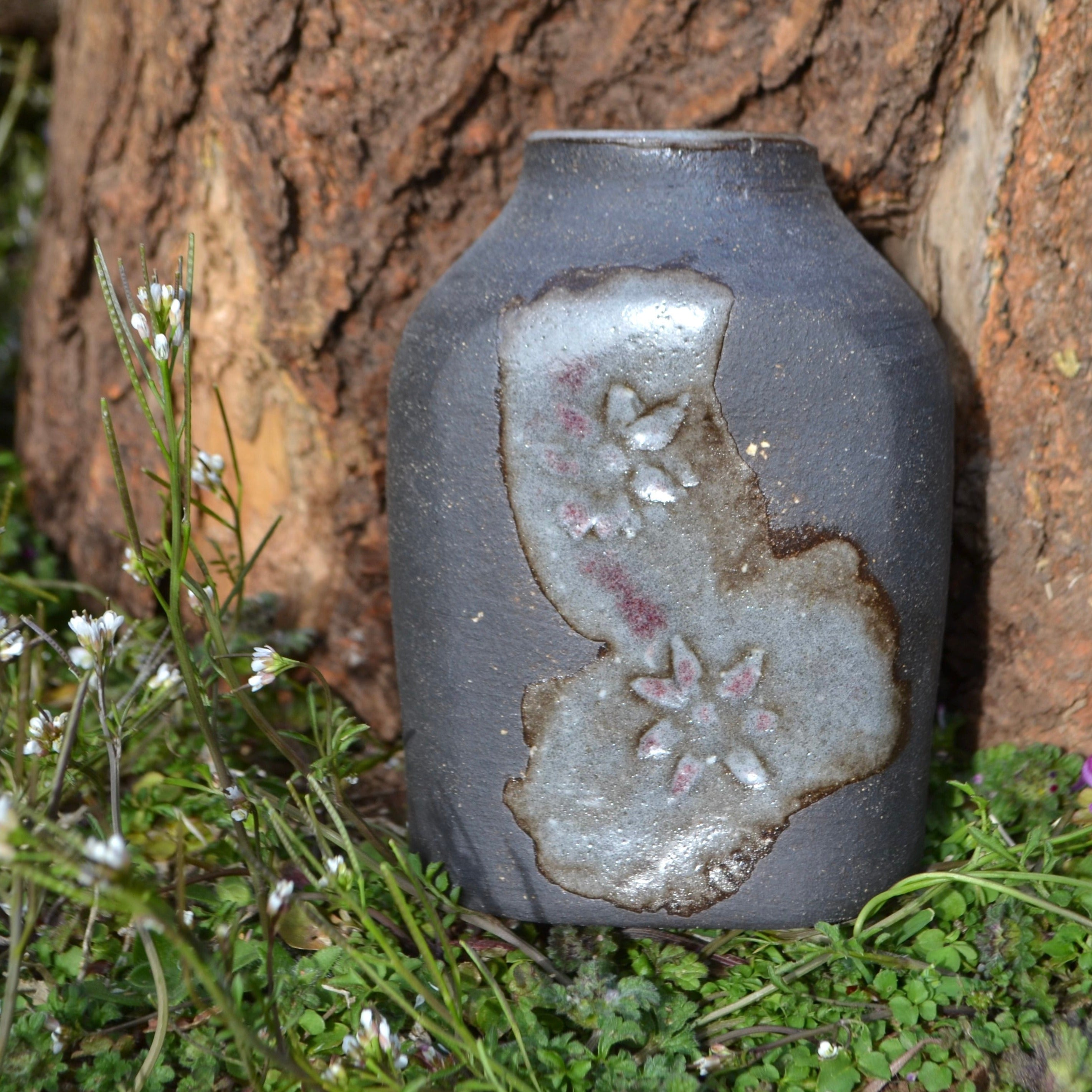 Flower Paddled Bottle | Panther Pots by Joseph Clayton – Ruby Clay Company